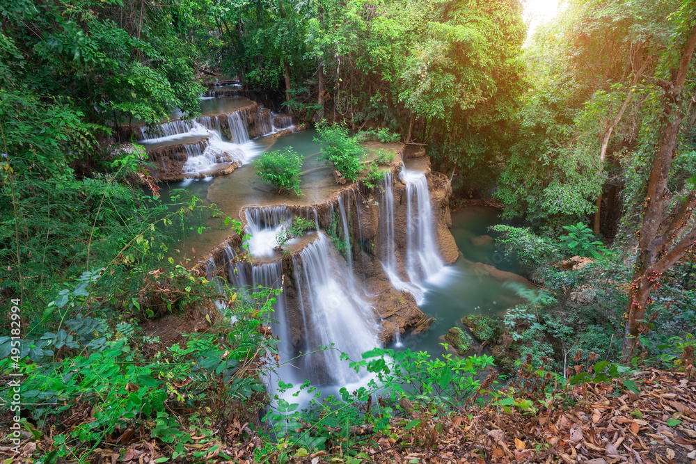 waterfall clear emerald water on summer by side view for holiday relax ...