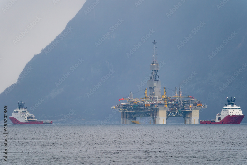 Hareid, Norway - 2022 March 24. Rig move of Equinor oil platform Njord ...