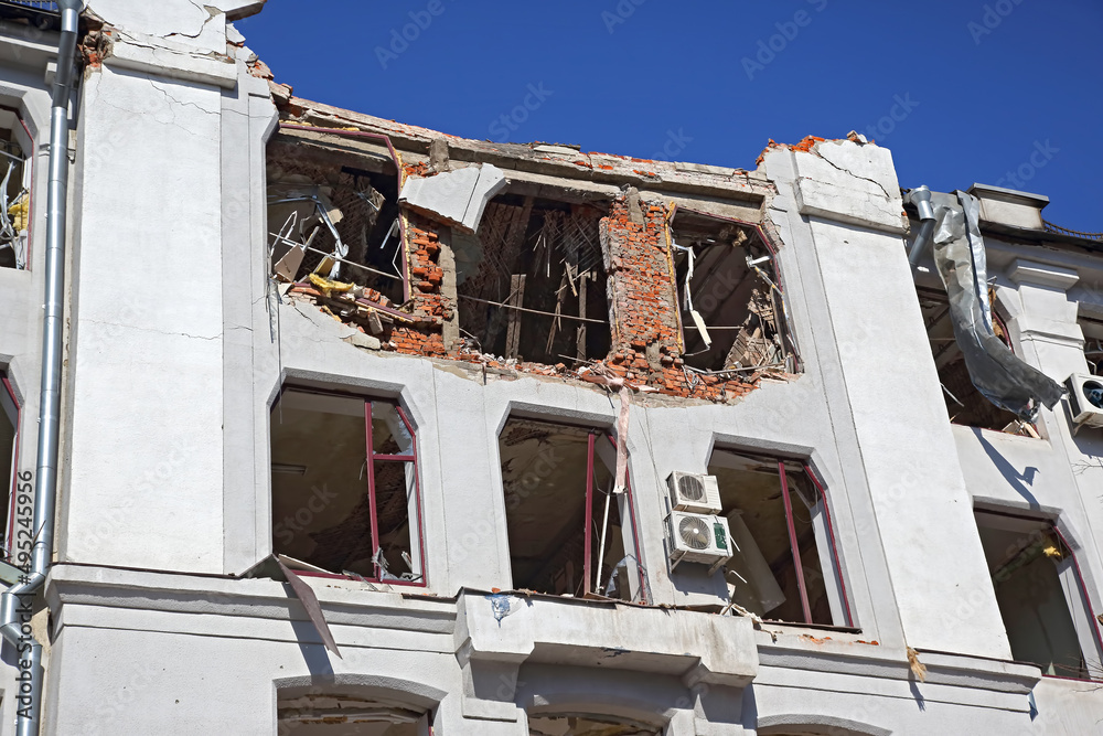 War in Ukraine. Destroyed Ukrainian house in the city of Kharkov as a ...