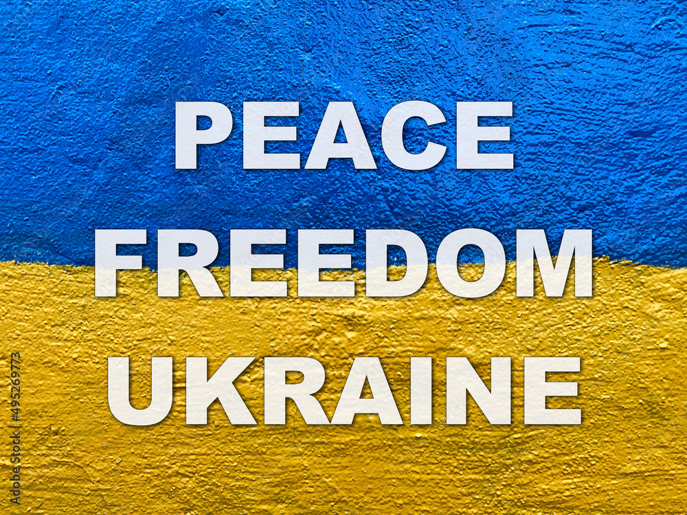slogan Peace, Freedom, Ukraine on Ukrainian flag painted on wall Stock ...