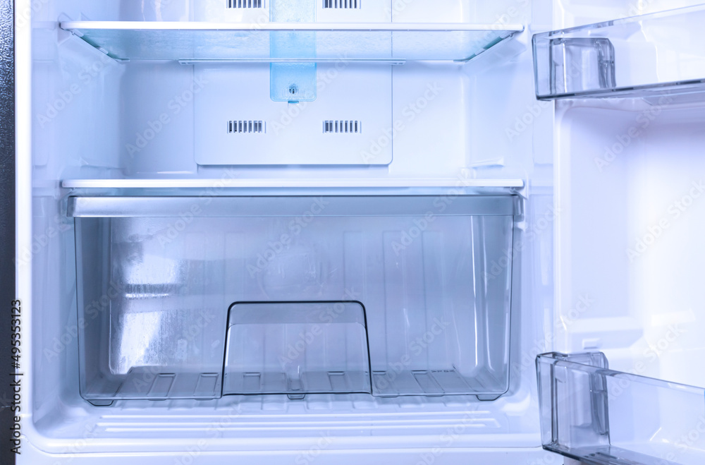 new modern refrigerator opens to reveal the inside. Stock Photo | Adobe ...