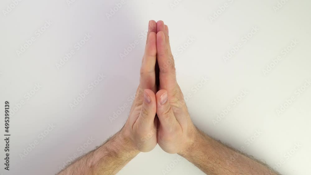 Lay out Hands in a gesture of prayer. Top view of caucasian hands on a ...