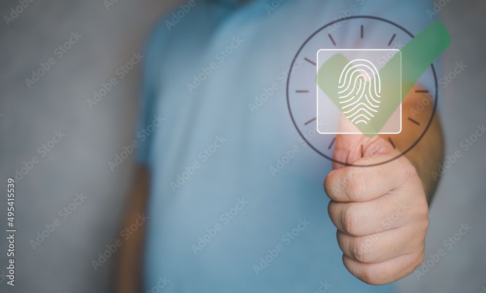 Man use a fingerprint for scan to check in to work. HR concept Stock ...