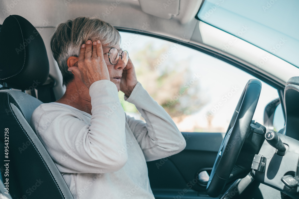 One senior or mature female people having and feeling bad headache in ...