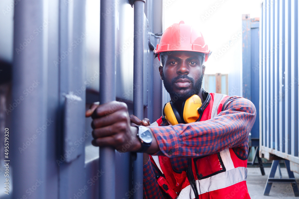 Portrait of African American young engineer worker man wearing safety ...