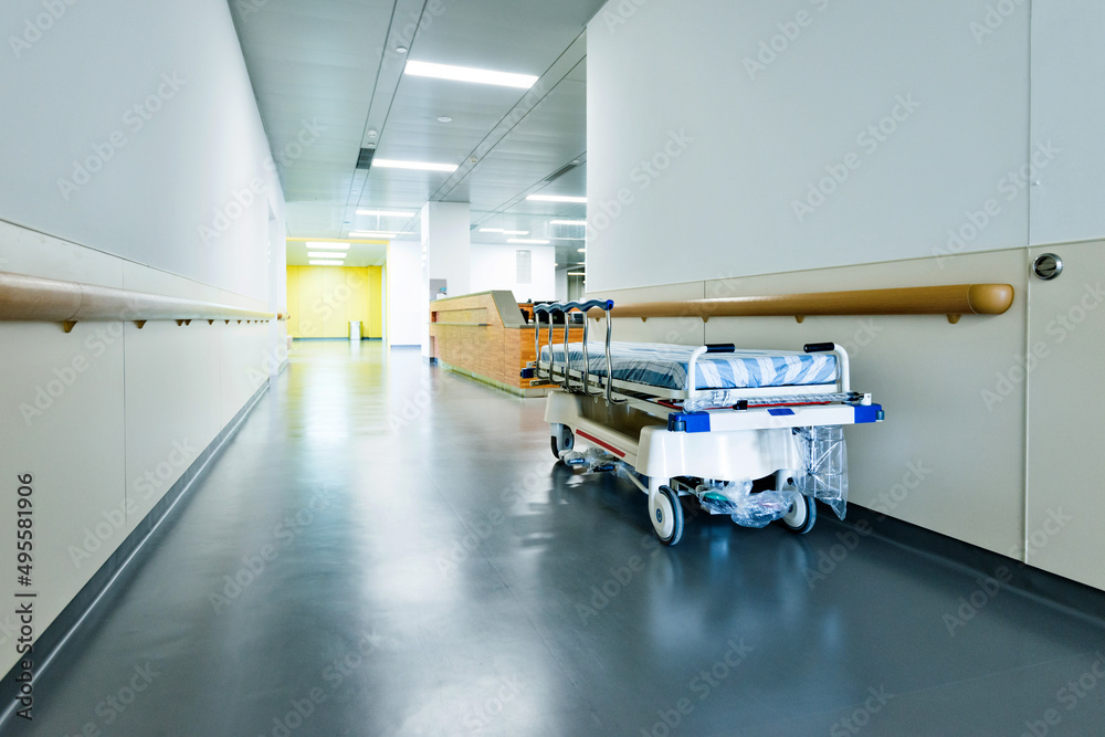 Empty hospital hallway with surgical transport equipment Stock Photo ...