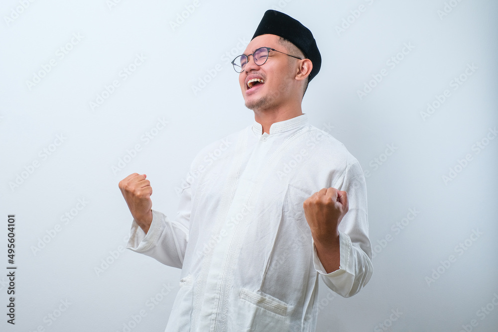 Successful happy muslim man screaming shouting and shows winning ...