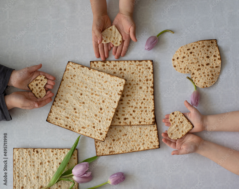 Children hands hold Matzah shape of heart. Traditional of Jewish ...