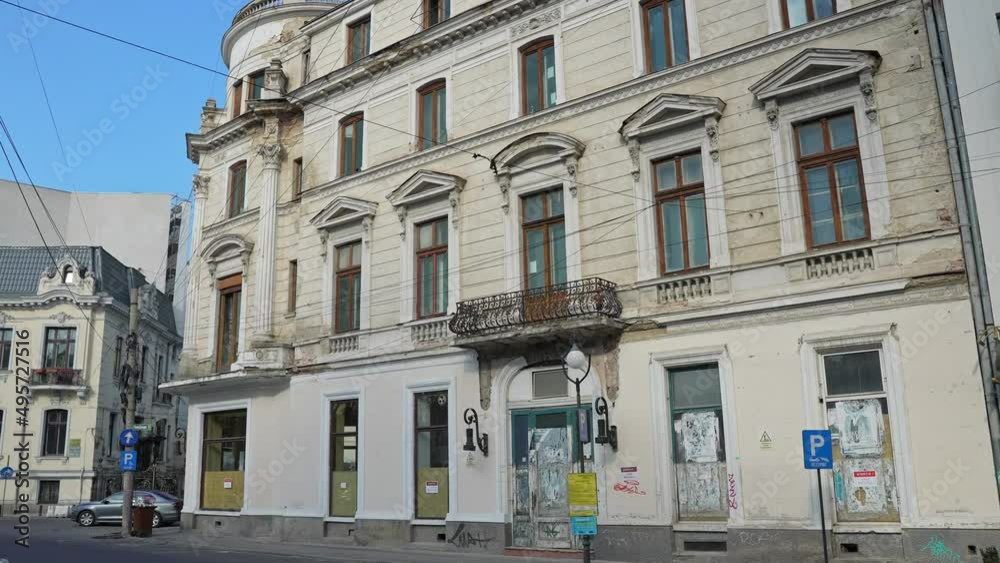 Old building in Bucharest about to be renovated next to the Romanian ...