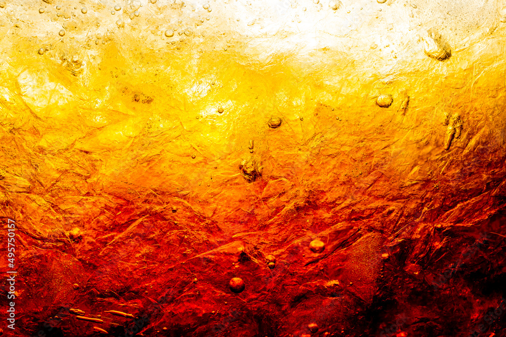 macro soft drink texture,Close up view of the ice cubes in dark cola background. Texture of ...