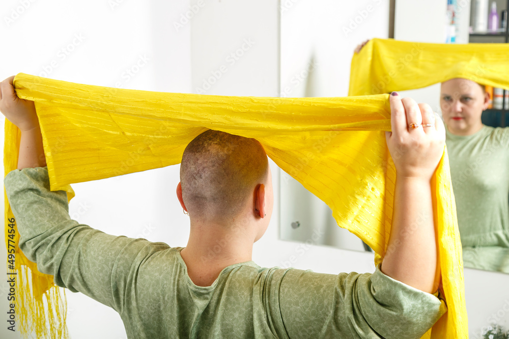 A Jewish Hasidic woman from the Orthodox community cries, shaved bald ...