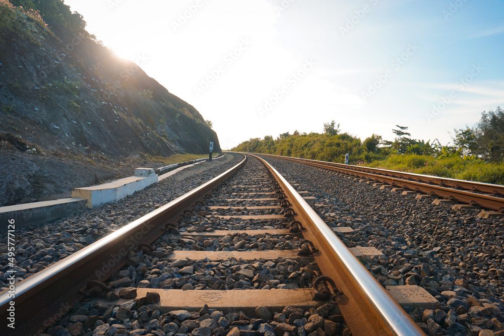 Poster The railroad tracks pass through the grooved bearings buried ...