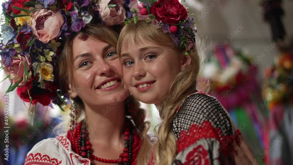 Close-up charming girl smiling looking at camera as beautiful woman ...