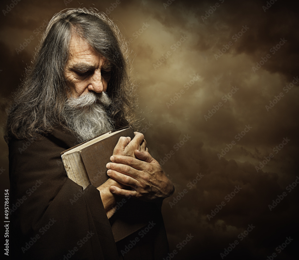 Praying Monk with Bible. Prophet holding Book. Old Man Portrait with ...