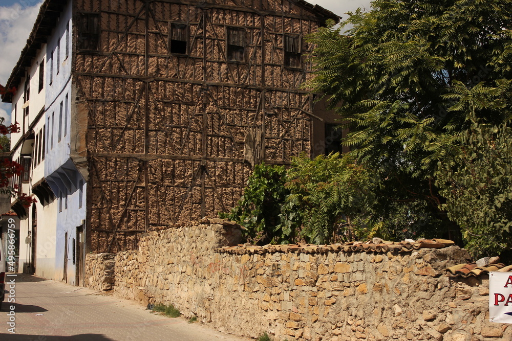 Old vintage masonry village house made of stones, bricks, wood ...