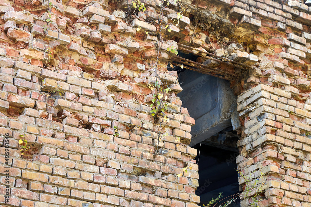 old abandoned brick building without windows frames and crumbling ...