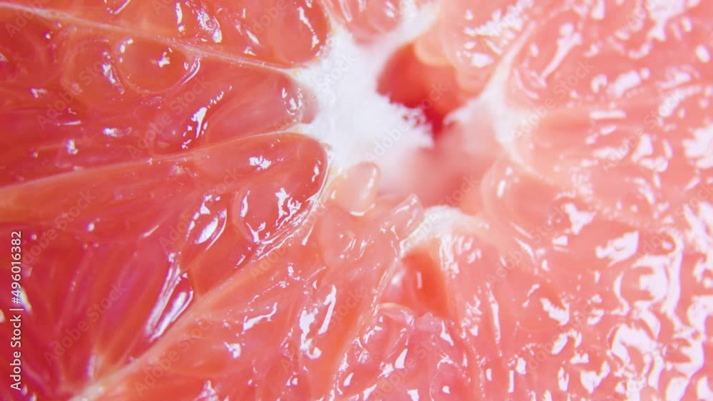 Extreme close up Colorful fresh red citrus fruit slices footage of ...