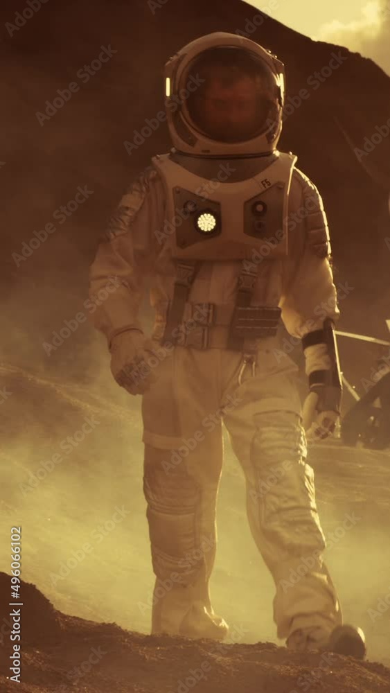 Astronaut on Mars Walking on the Exploring Expedition. In Background ...