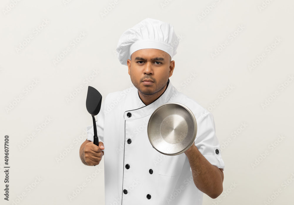Chef warrior. Young asian man masterchef holding Armed and ready to go ...