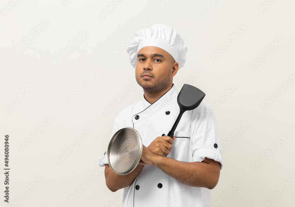 Chef warrior. Young asian man masterchef holding Armed and ready to go ...