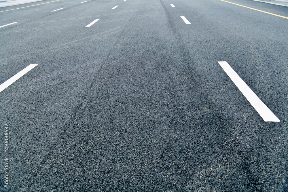 Asphalt road with white dashed lines Stock Photo | Adobe Stock Asphalt road with white dashed lines Stock Photo | Adobe Stock