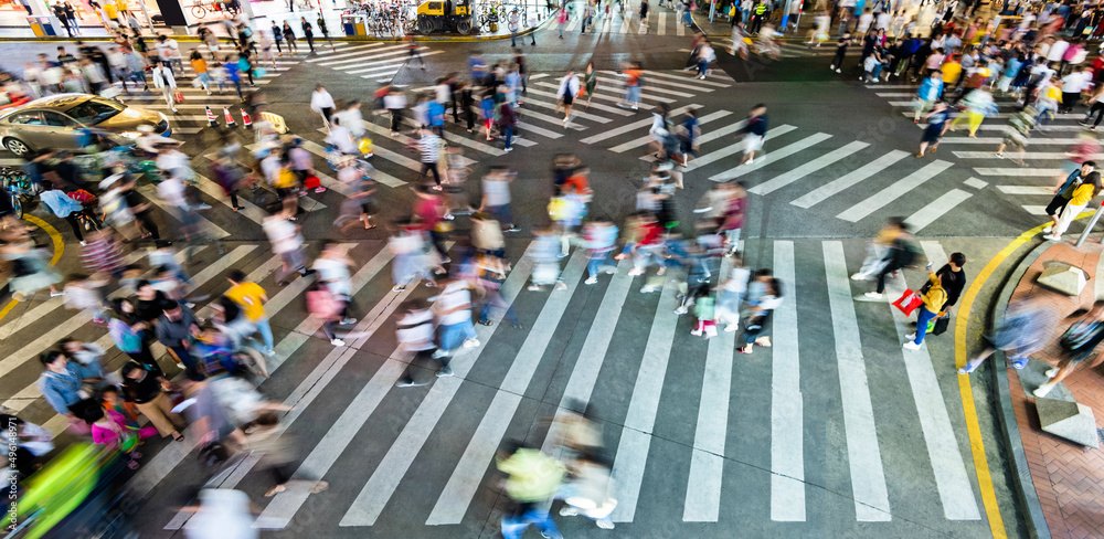 Crowd of people crossing the crosswalk Stock Photo | Adobe Stock