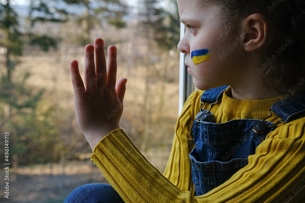 Stop war concept. Pray for Ukraine. Ukrainian frightened child sitting ...