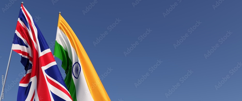 Flags of the United Kingdom and India on flagpoles on side. Flags on a ...