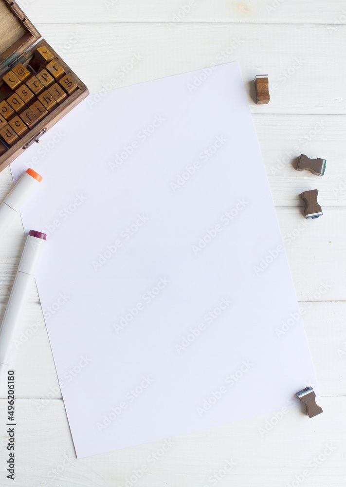 Mockup for A4 paper with woodden letters stramps , and markers Stock ...