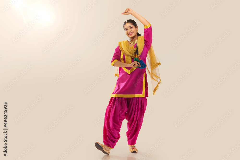 Sikh Woman performing bhangra during Baisakhi Celebration Stock Photo ...