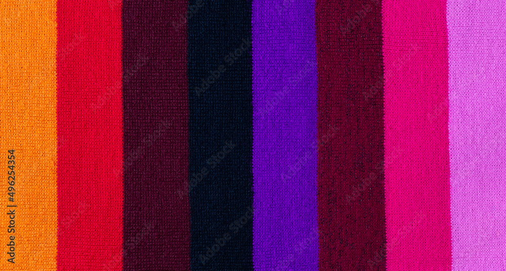 multi colored background. knitted wool fabric texture with stripes ...