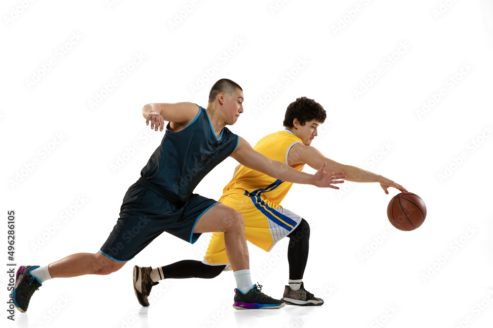 Dynamic portrait of two young basketball players playing basketball ...