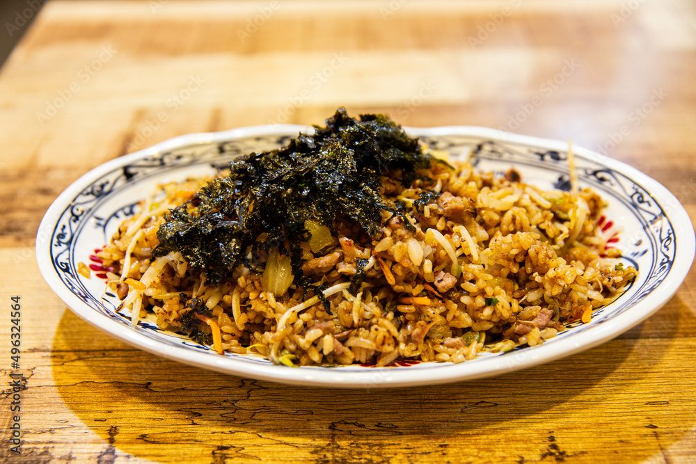 Fried rice with rice, vegetables, seaweed, gochujang, sesame oil, etc ...