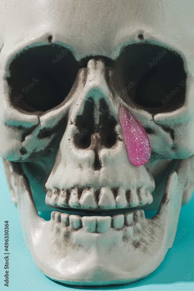 Human skull with slime tear falling from the eye. Future death and ...