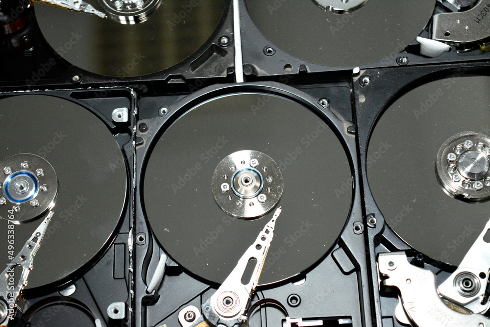 Disassembled computer hard disk drive storage memory with platters ...