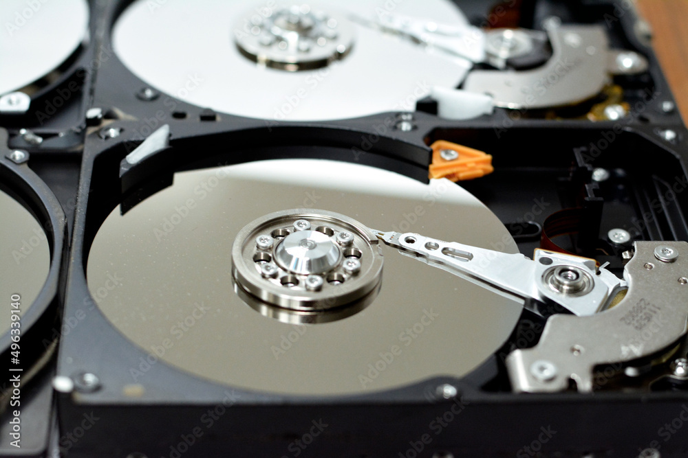 Disassembled computer hard disk drive storage memory with platters ...