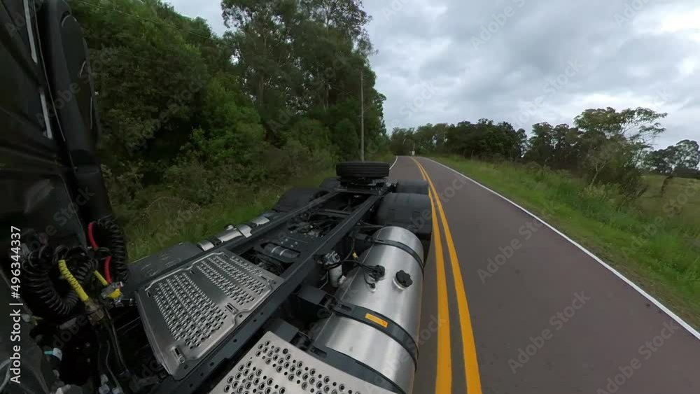 Video „Rear view perspective of truck driving a on a country road under ...