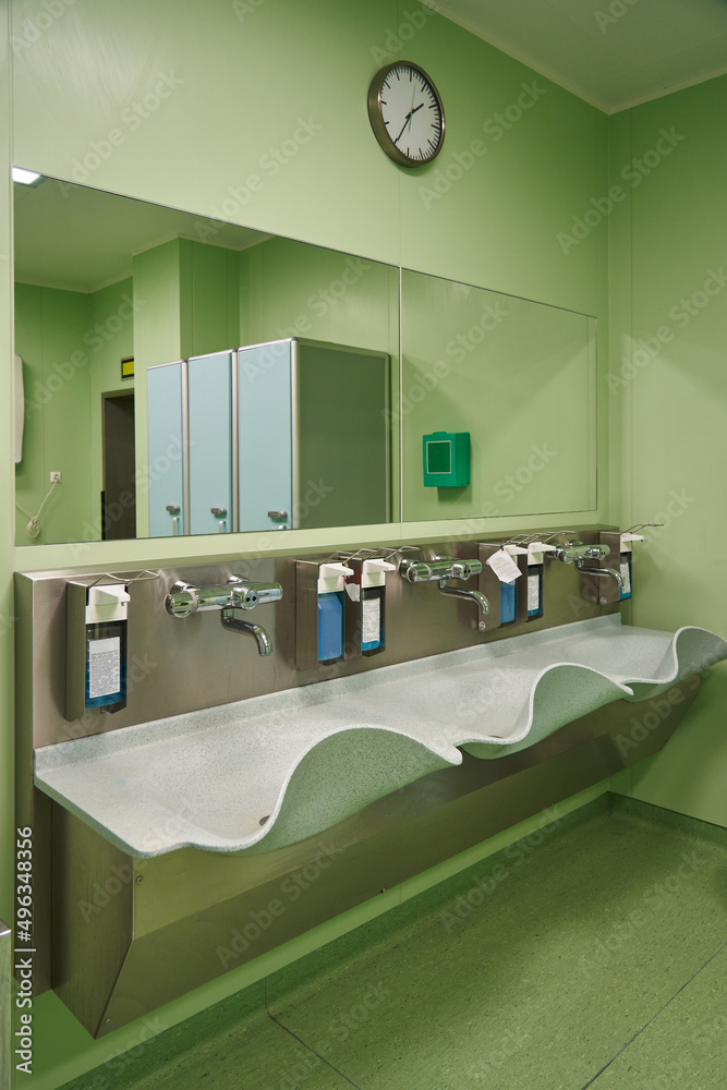 sinks in operating room with disinfectant soap to disinfect hands ...