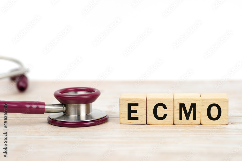 ECMO (Extracorporeal Membrane Oxygenation) word is written on wood ...