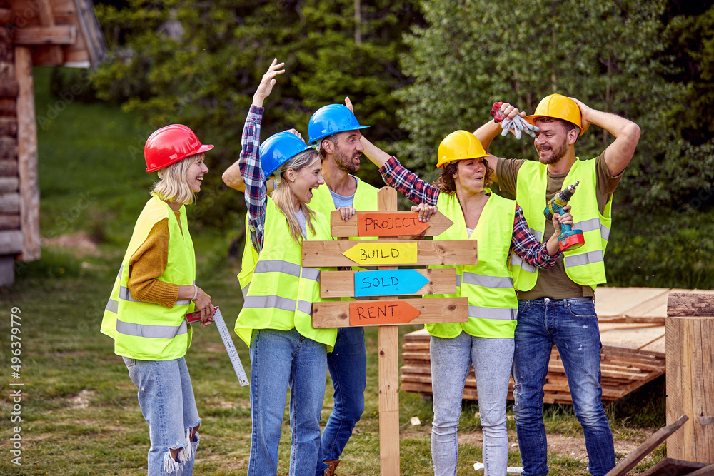 teamwork woodworker with wooden board.wooden house structure, building ...