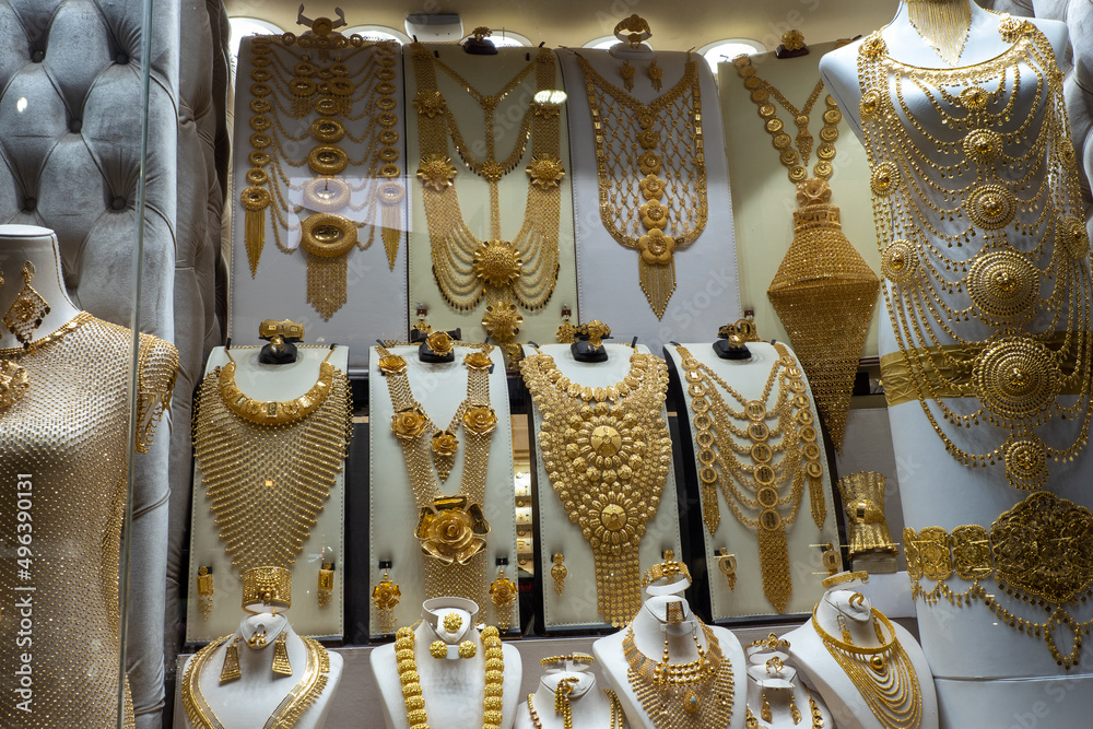 UAE, Dubai.29.03.2022. Showcases of the gold market. Products from pure ...