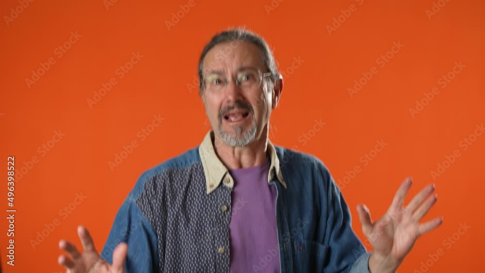 Scared shocked elderly bearded man 50s 60s look camera covering hiding ...