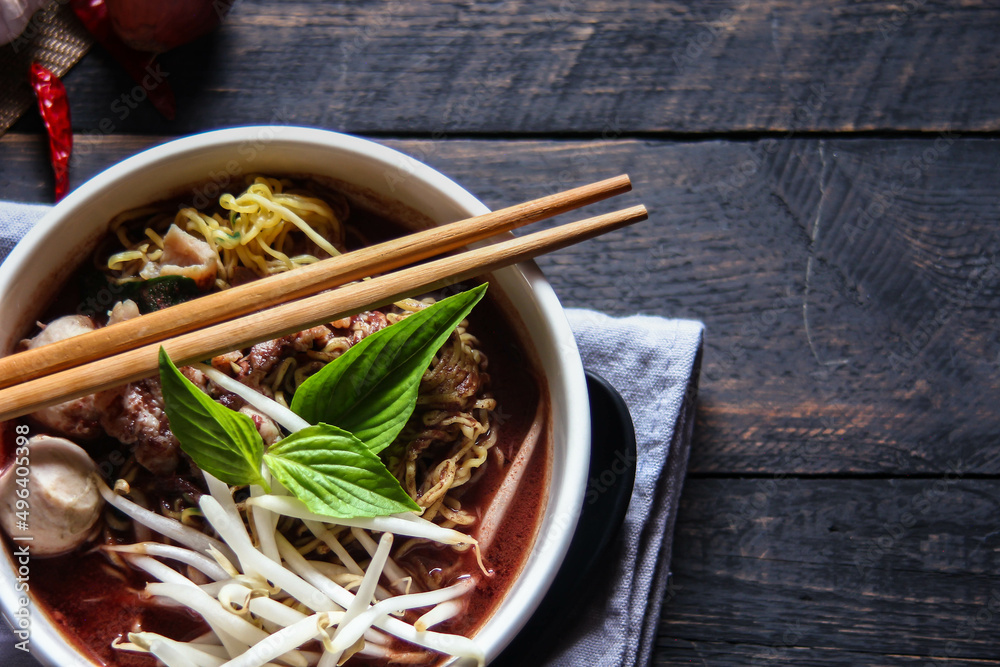 Thai noodle with pork is a street food that is commonly sold in ...