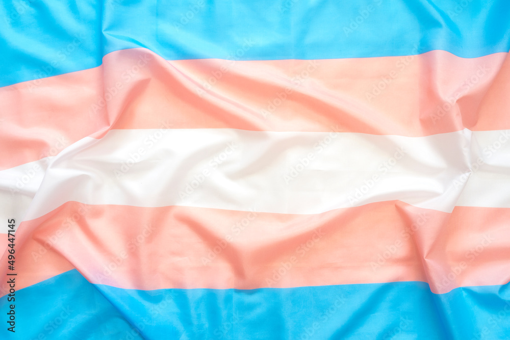 Fabric symbol of transgenders persons, transgender flag, as background ...