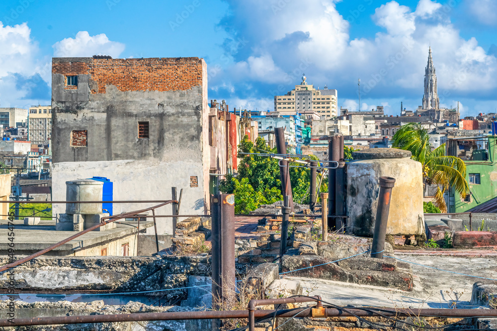 HAVANA, CUBA, Run-down rooftops compared famous landmarks. In the ...