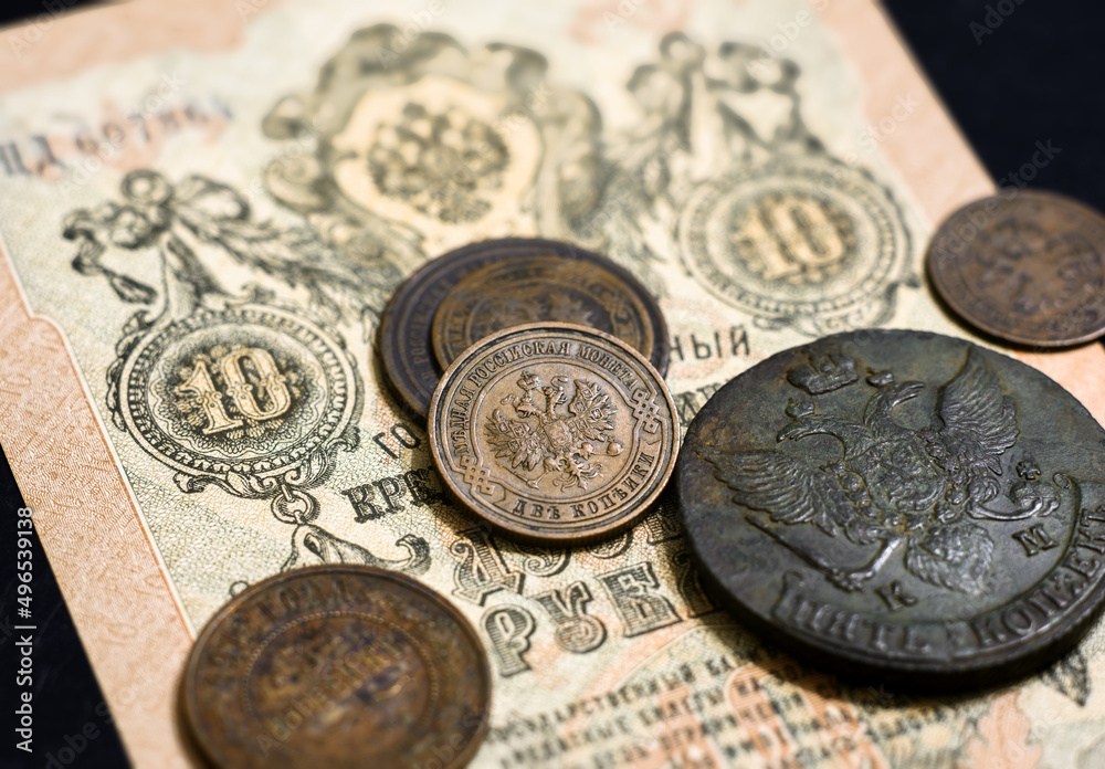 Money of Russian Empire on table, old vintage copper coins and banknote ...