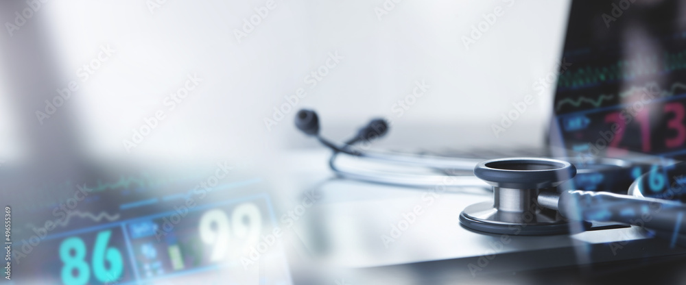Medical technology background. Doctor's stethoscope and laptop computer ...