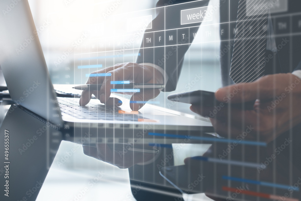 Project manager working and update tasks with milestones progress ...