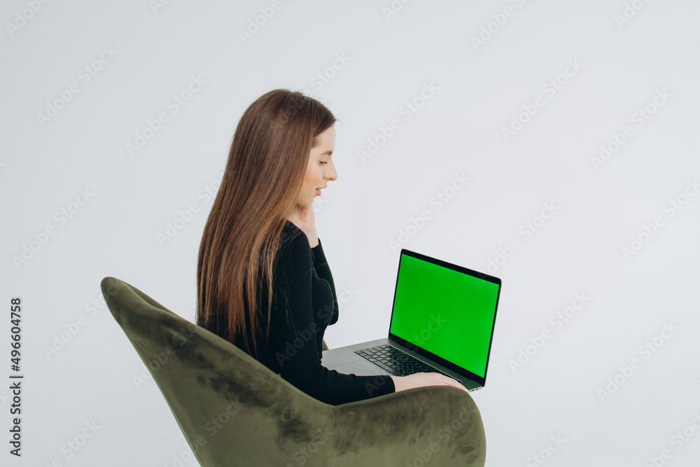 Over The Shoulder View Of Woman Lying On Sofa Using Green Screen Laptop ...