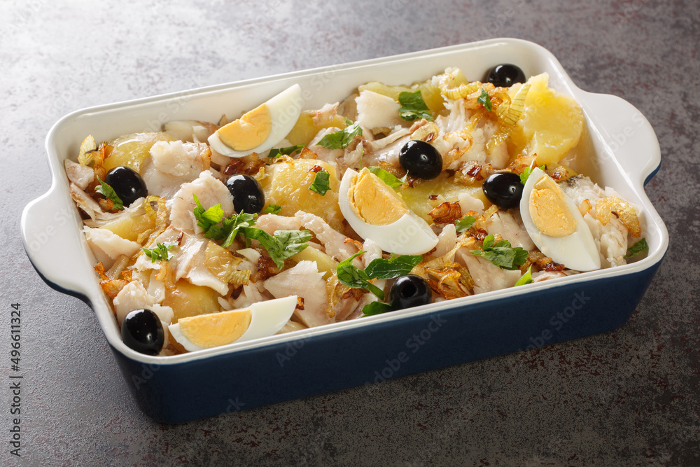 Bacalhau a Gomes de Sa salt Cod, Onions and Potatoes closeup in the ...